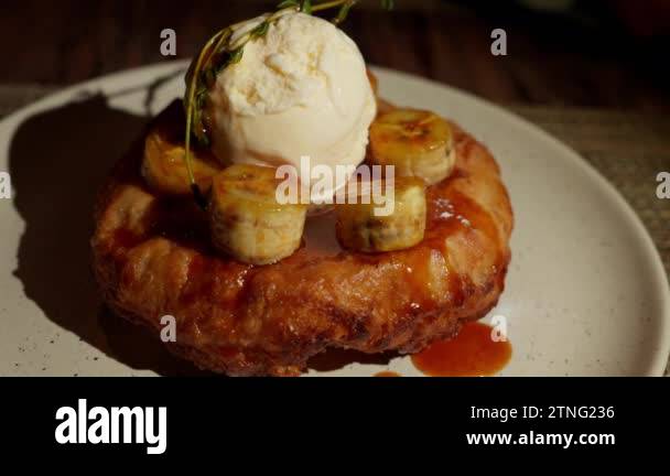 Indulgence takes center stage with fried roti served alongside creamy ...