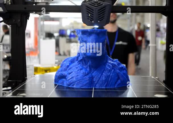 3D printer printing object close-up. Process creating three-dimensional model on 3d printer ...