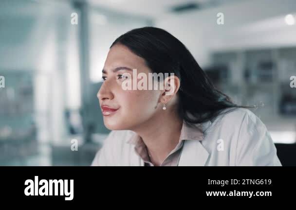 Scientist, woman and thinking in a laboratory with reading, research and confused from analysis ...