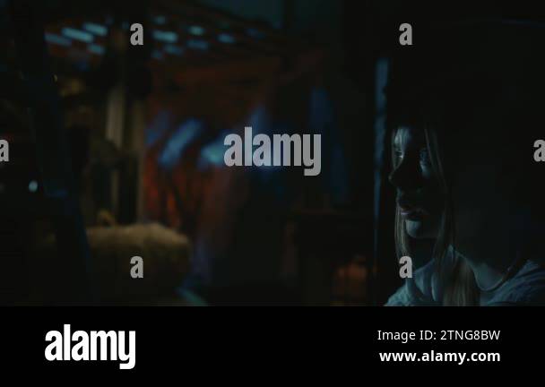 Horror movie scene. Closeup shot, focus on female face. Scared blonde ...