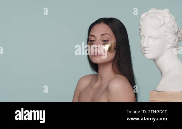 Portrait Of A Seminude Woman With Golden Patches Under Her Eyes On A