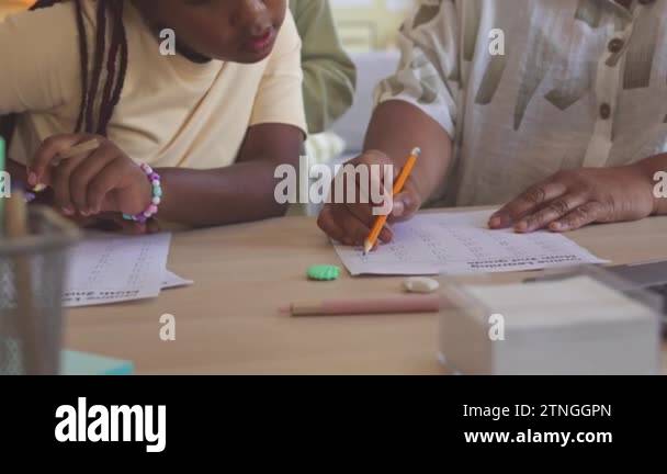Boy helping girl math Stock Videos & Footage - HD and 4K Video Clips ...