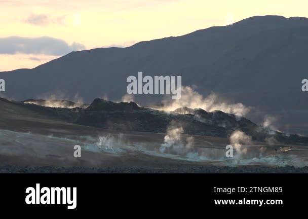 Iceland. Hot steam above the ground. Smoking fumaroles. Active sulfur ...