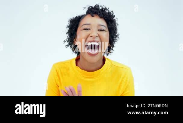 Face, funny and woman with applause, smile and winner on a white studio ...