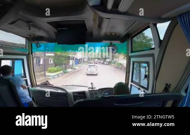 Bus riding in an intercity bus. Bus traveling View from the front seat ...