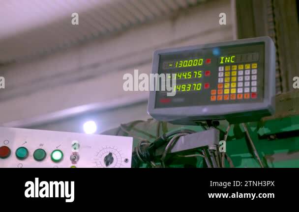 A large industrial milling machine with a digital control panel Stock ...