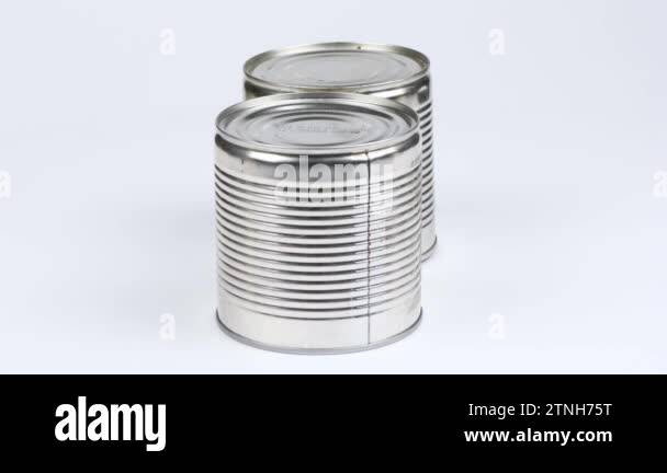 Two metal cans on a white background. Side view. Loop motion. Rotation ...