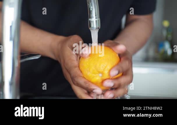 Hand washing fruit Stock Videos & Footage - HD and 4K Video Clips - Alamy