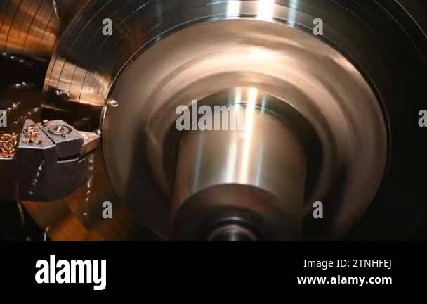 Close up pan scene the lathe machine finish cut the brass parts by ...