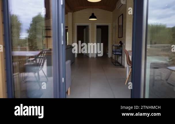 Live camera entering comfortable accommodations in summer house on ...
