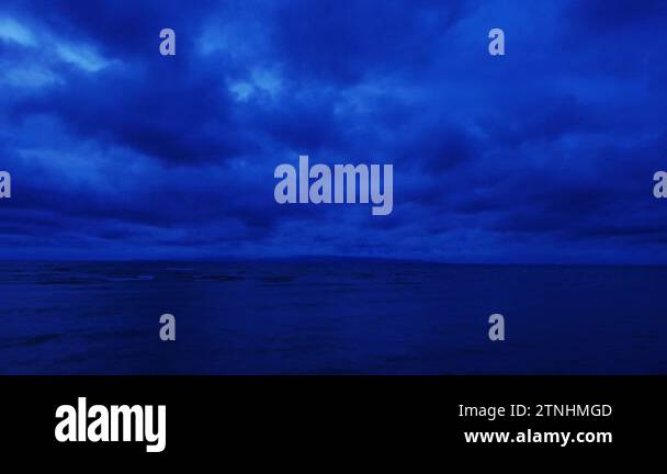 A very blue, cloudy sunrise video from Dumaguete City shores. Video ...