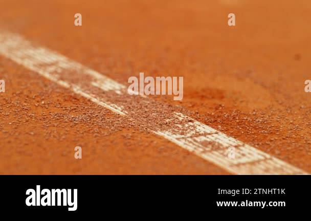 Super slow motion of Tennis ball ping on clay court inside or outside ...