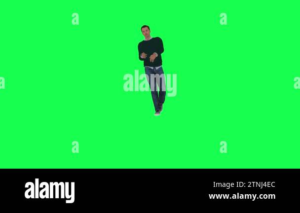 A man with a normal athletic body in the green screen with tall height ...