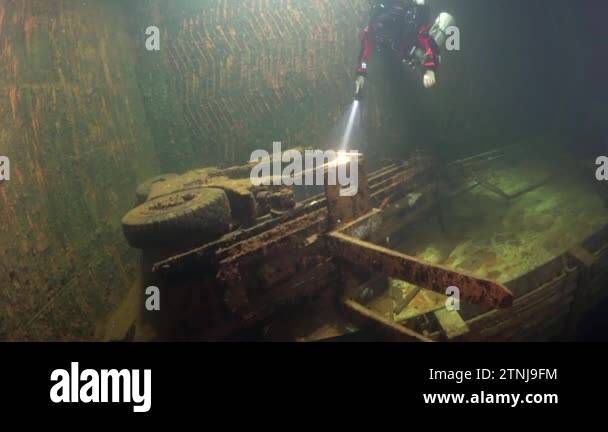 Scuba divers swims on the Shipwreck Swedish ferry MS Zenobia. Wreck ...