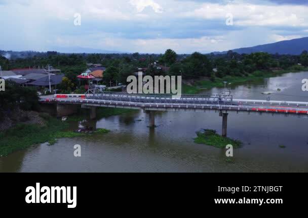 Repair of a concrete bridge across a river in the countryside. Repair ...