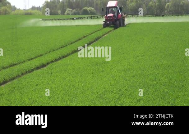 Tractor agriculture herbicides spraying Stock Videos & Footage - HD and ...