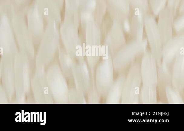Dry Uncooked White Rice Background Moving Downward - Top View, Close-Up ...