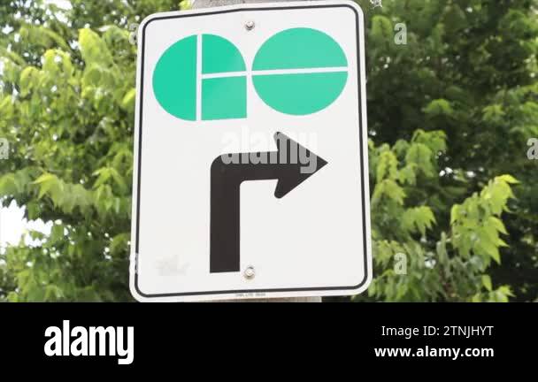 go train vertical rectangle sign logo with arrow pointing up and right ...