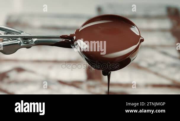 liquid chocolate texture. Process of making a chocolate bars Stock ...