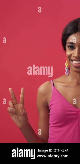 Vertical video. Finger counting. Hand numbers. Gesture communication. Cheerful smiling woman ...