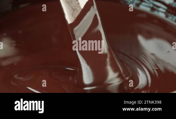 liquid chocolate texture. Process of making a chocolate bars Stock ...