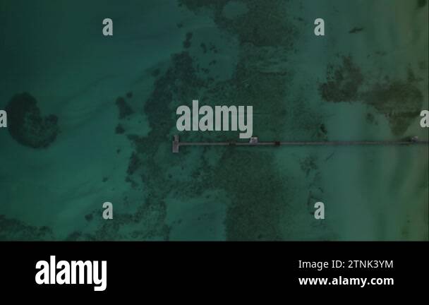 A bird's-eye view of a jetty situated along the foreshore, where the ...