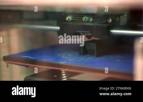 3D printing process. Printing of little plastic tool. Mechanism of 3D ...