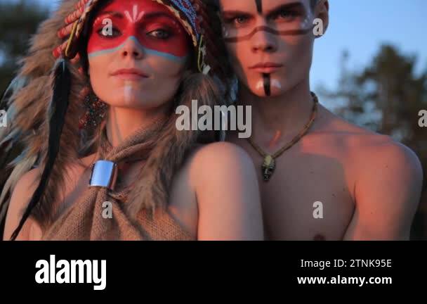 Beautiful native american Indian man and woman in traditional dress ...