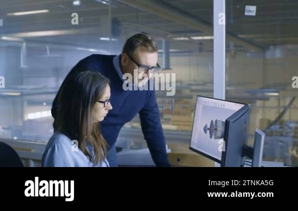 Female Industrial Engineer and Male Project Manager Work on 3D Turbine ...