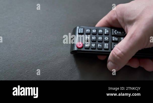 Using remote control Stock Videos & Footage - HD and 4K Video Clips - Alamy