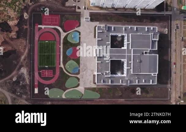 Large stadium in residential neighborhood. Sports ground with soccer ...