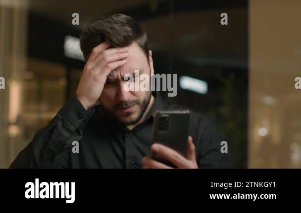 Upset frustrated Caucasian businessman read bad message receive ...