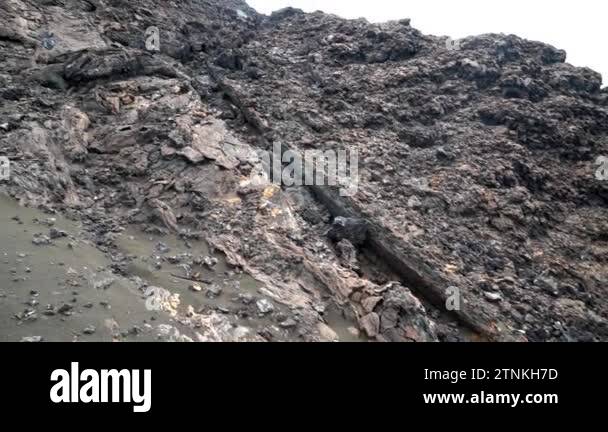 sharp cliffs of the volcanic landscape of Bartolome Island with famous ...