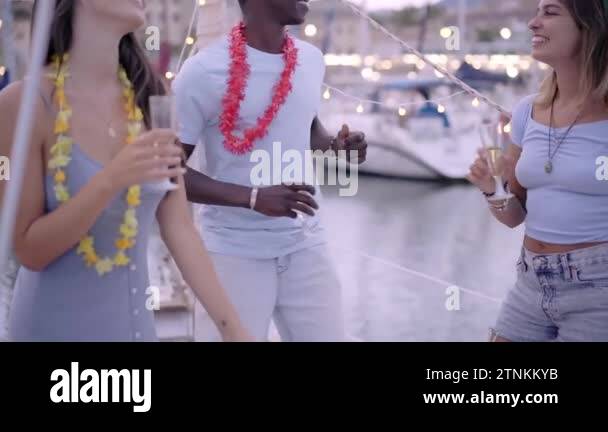 Company of Young Friends in a Party Boat. Happy People Celebrating ...