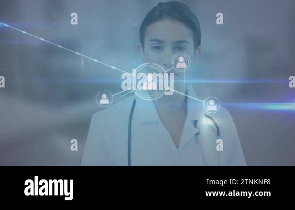 Animation of connected people icons and lens flare over portrait of ...