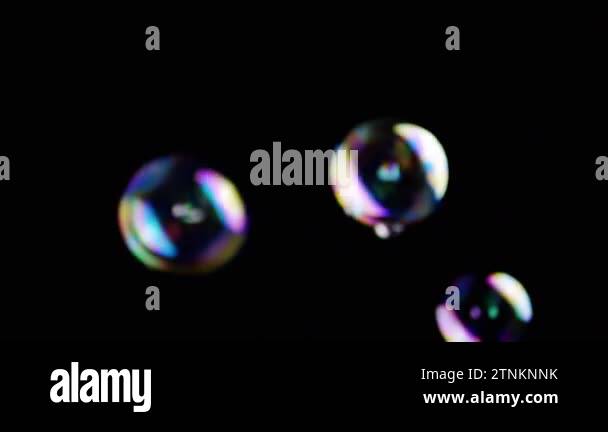 Colorful Soap Bubbles Fly in an Empty Space on Isolated Black ...