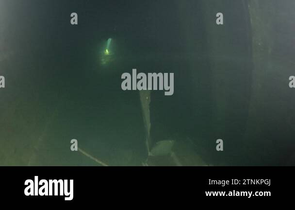 Scuba divers swims on the Shipwreck Swedish ferry MS Zenobia. Wreck ...