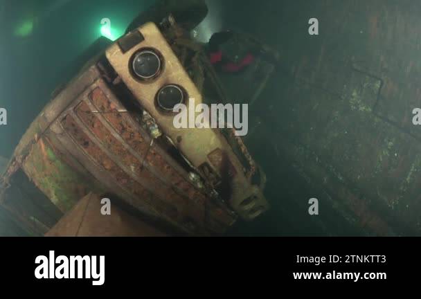 Scuba divers swims on the Shipwreck Swedish ferry MS Zenobia. Wreck ...