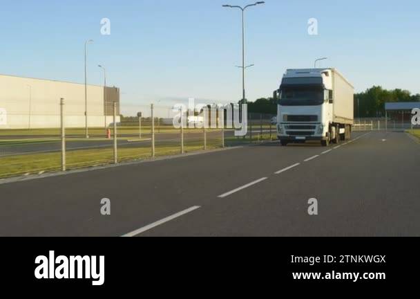 Semi-Truck with Cargo Trailer Moving on a Highway. White Truck ...