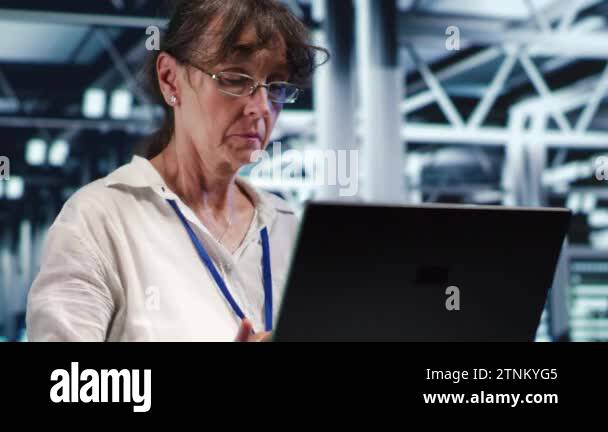 Dilligent inspector overseeing high tech workplace housing GPU ...