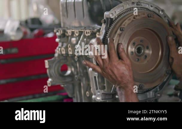 Fitting and Checking the Flywheel Gear of the Car Engine Footage Stock Video Footage - Alamy
