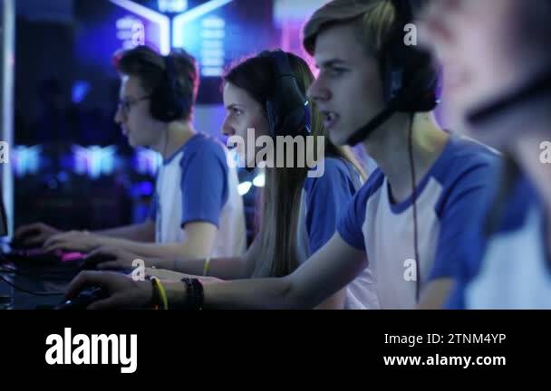 Team of Professional eSport Gamers Playing in Competitive Video Games ...