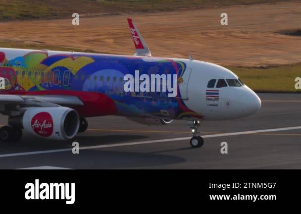 PHUKET, THAILAND - FEBRUARY 11, 2023: Commercial airplane of AirAsia ...