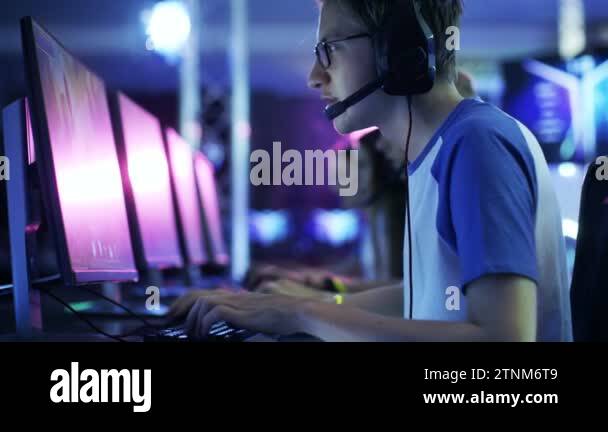 Team of Professional eSport Gamers Playing in Competitive MMORPG ...