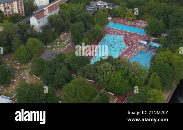 Packed over crowded public swimming pool Prinzenbad, city Berlin ...
