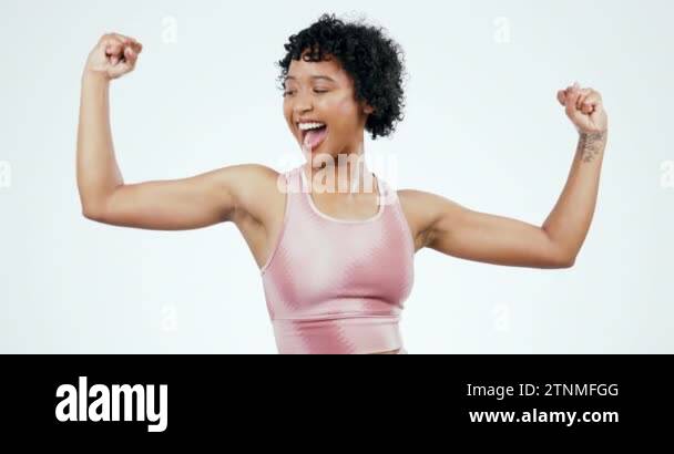 Fitness, woman face and arm flex in studio for training, health and ...