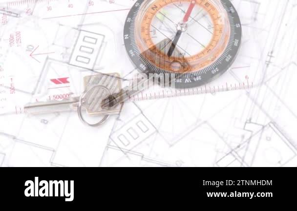Animation of compass and house keys over house plans. Architecture ...