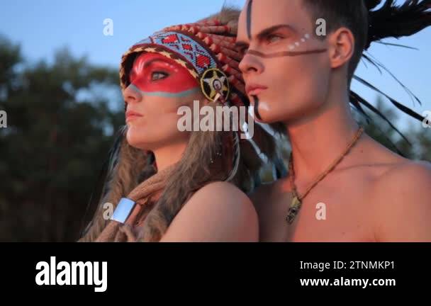 Beautiful native american Indian man and woman in traditional dress at ...