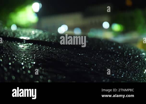 Car bonnet. Rain. Rain in the night. Light rainfall. Close-up of ...