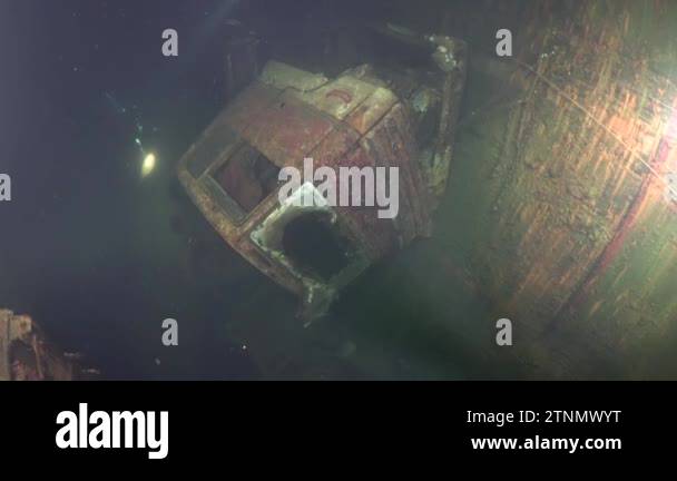 Scuba divers swims on the Shipwreck Swedish ferry MS Zenobia. Wreck ...